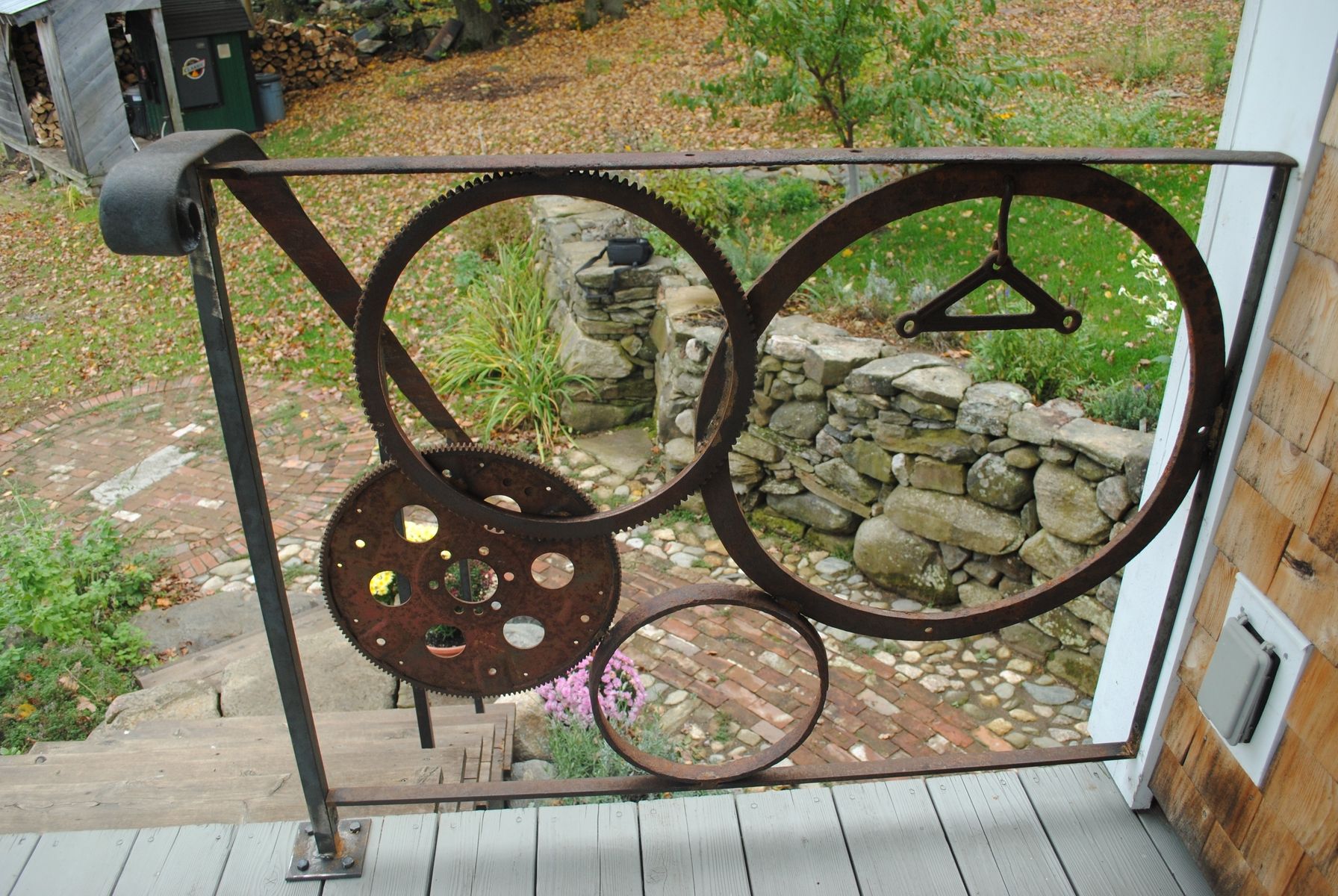 Custom Made Forged Iron Wagon/Gear Wheel Railing by Mystic Metallurgy ...