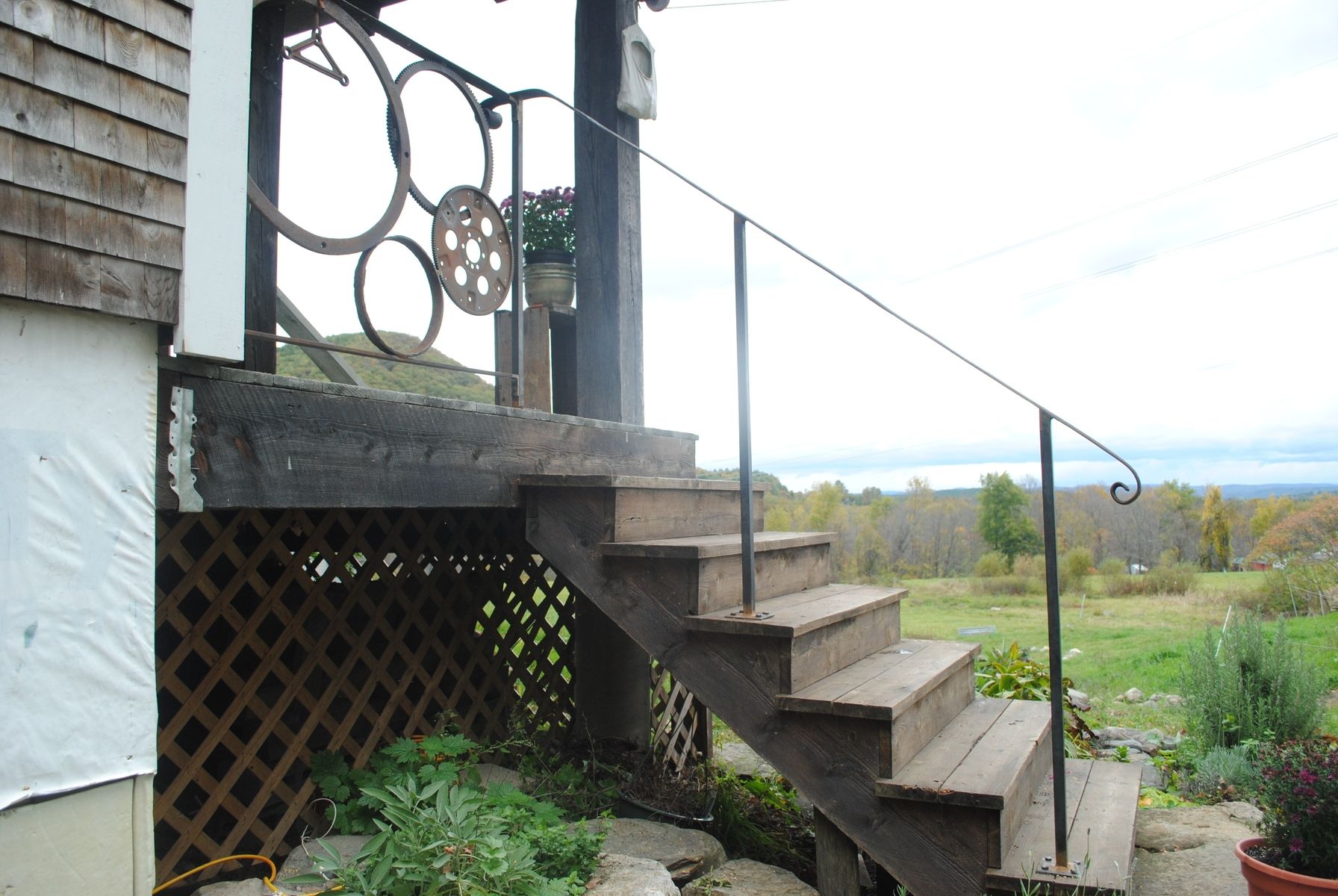 Custom Made Forged Iron Wagon/Gear Wheel Railing by Mystic Metallurgy ...